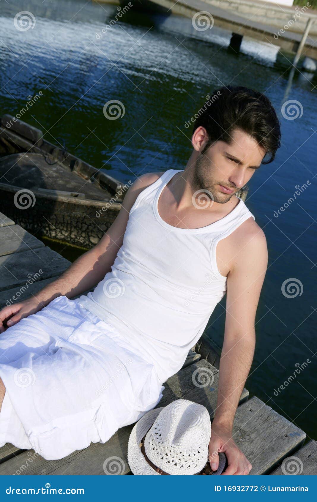 Mediterranean Young Man Relaxed on Wood Pier Stock Photo - Image of ...