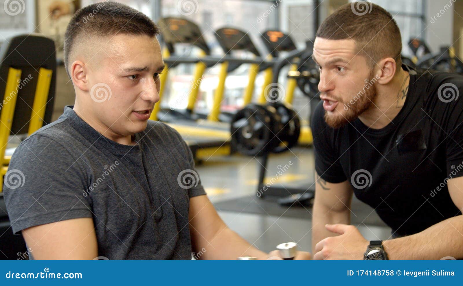 Young Man Shouted at by Instructor while Working Out in Gym Stock Photo ...