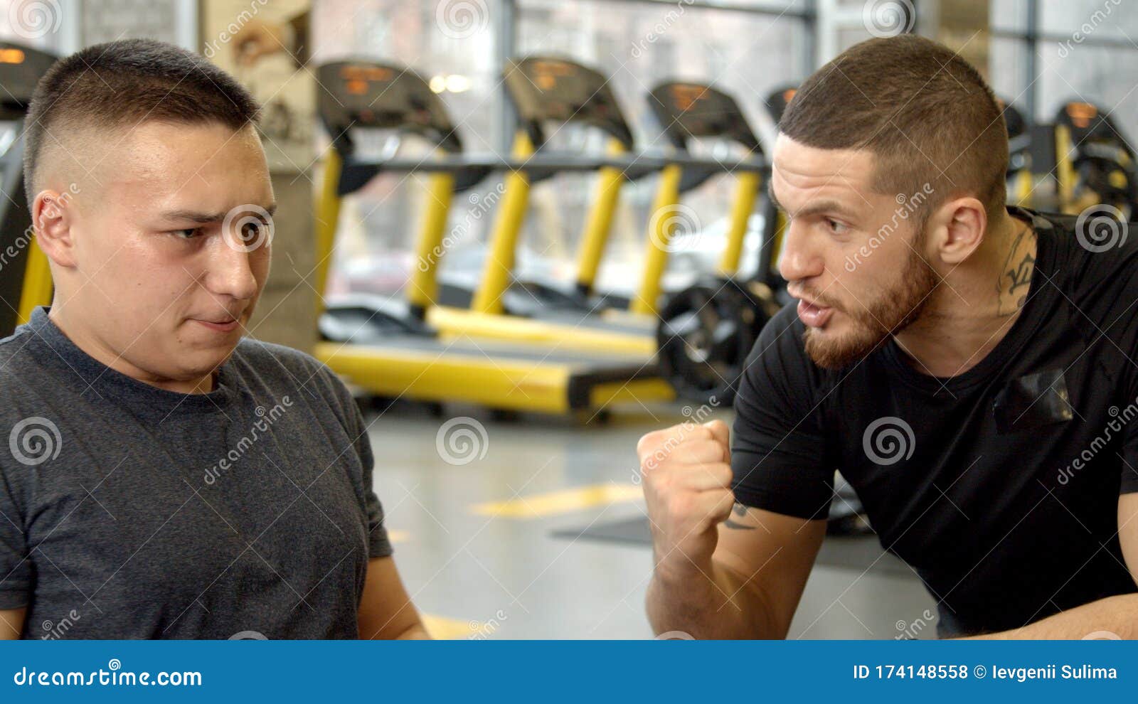 Young Man Shouted at by Instructor while Working Out in Gym Stock Photo ...