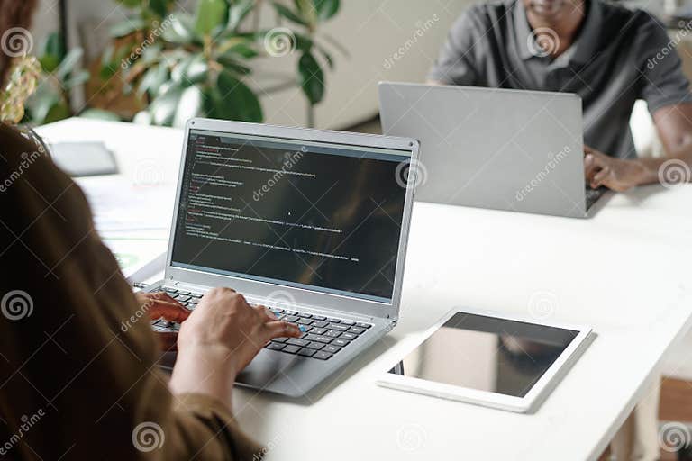 Unrecognizable Office Workers Writing Codes Stock Image - Image of woman, digital: 339141643
