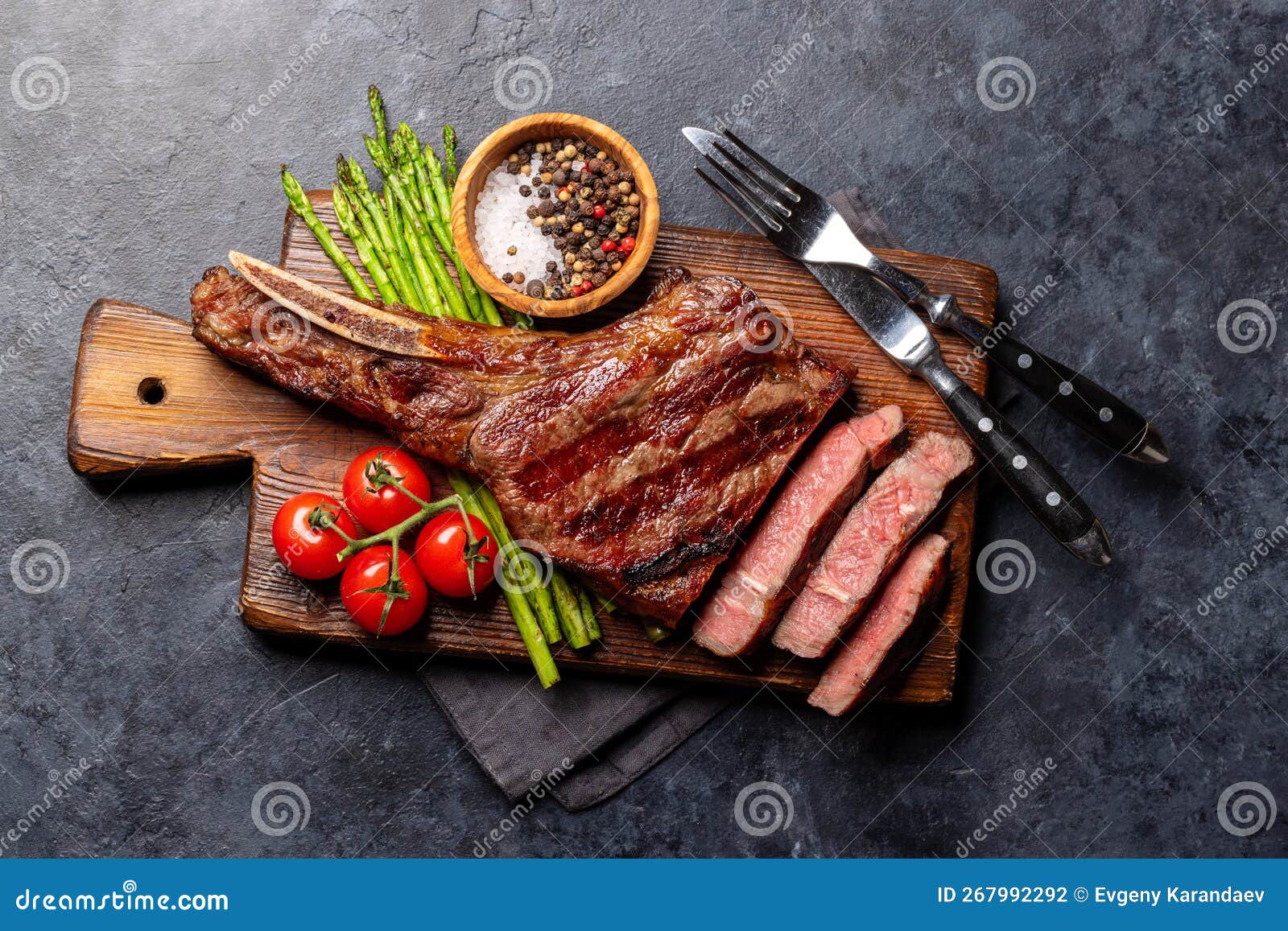 Medium Rare Grilled Tomahawk Beef Steak with Asparagus Stock Photo ...