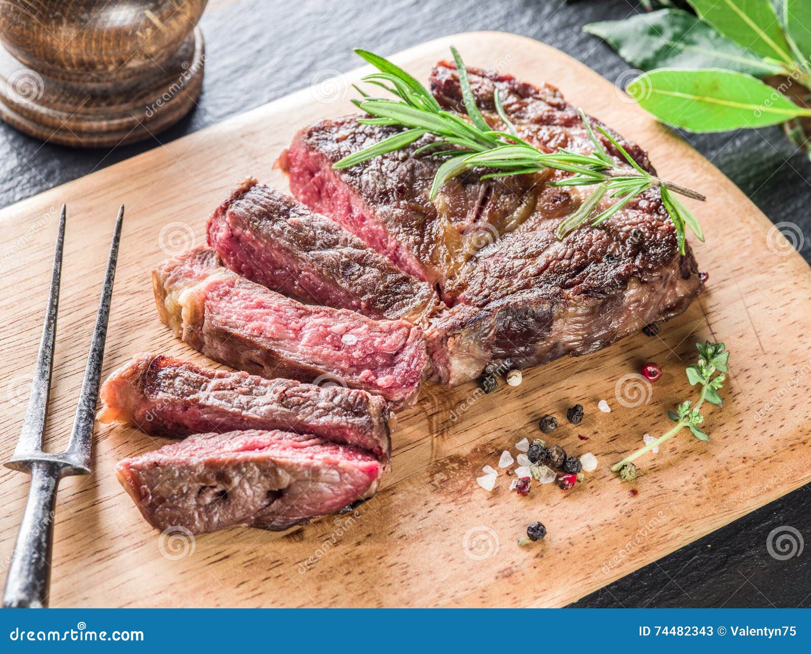 Medium Ribeye steak. stock image. Image of leaf, knife - 74482343