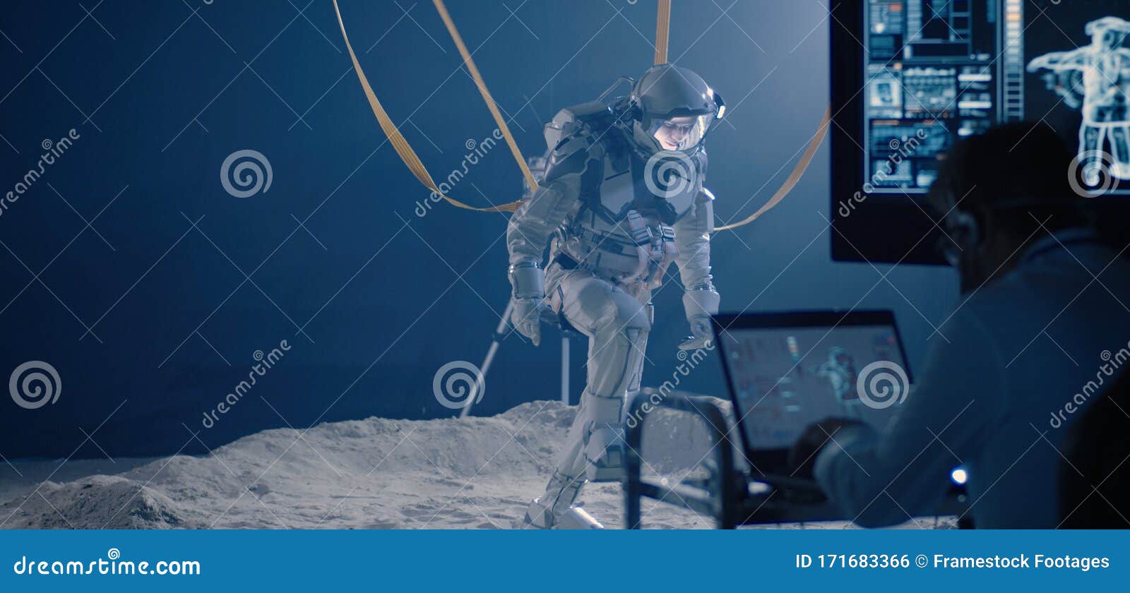 Astronaut and Scientists Testing Spacesuit Mobility Stock Photo - Image ...