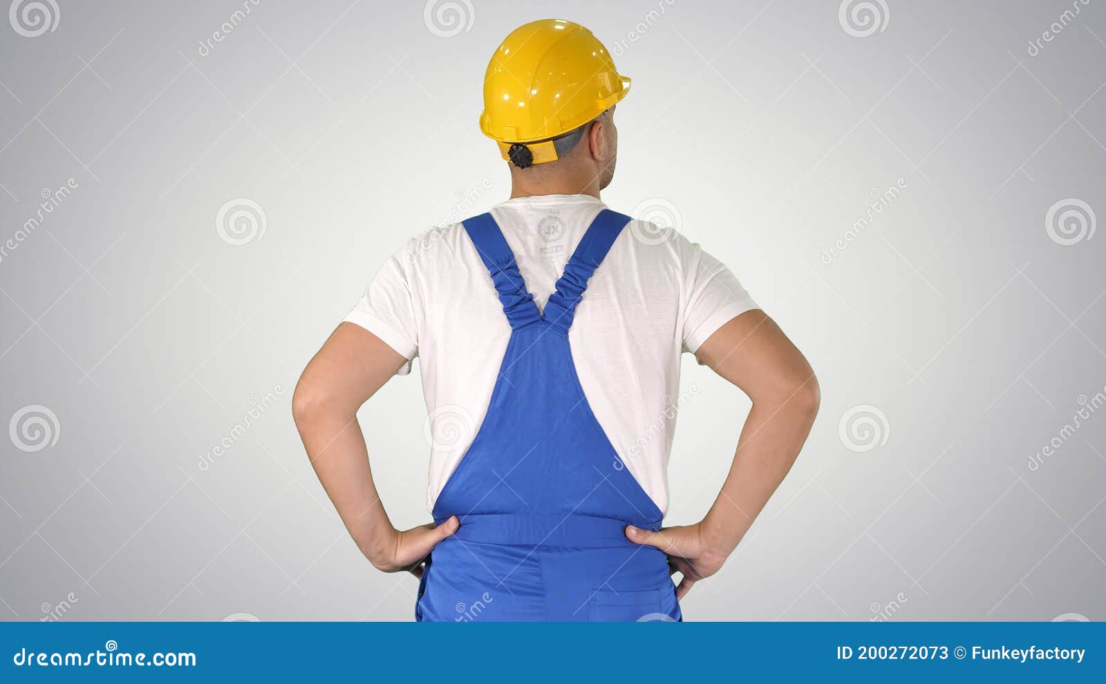Engineer in Construction Helmet Standing with Hands on Hips Look Stock ...