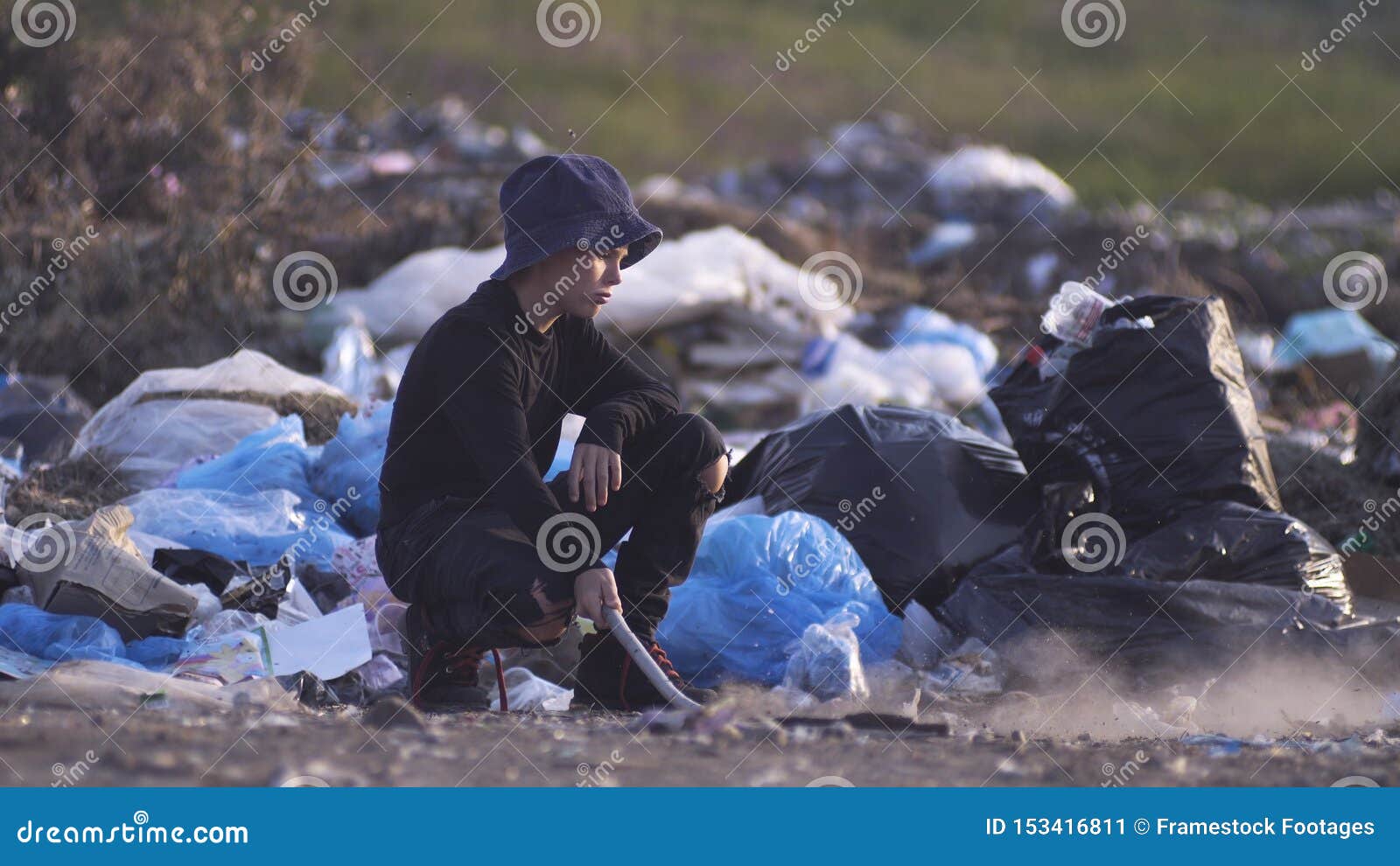 Bored Boy Making Dust in Dump Stock Image - Image of silent, kicking ...