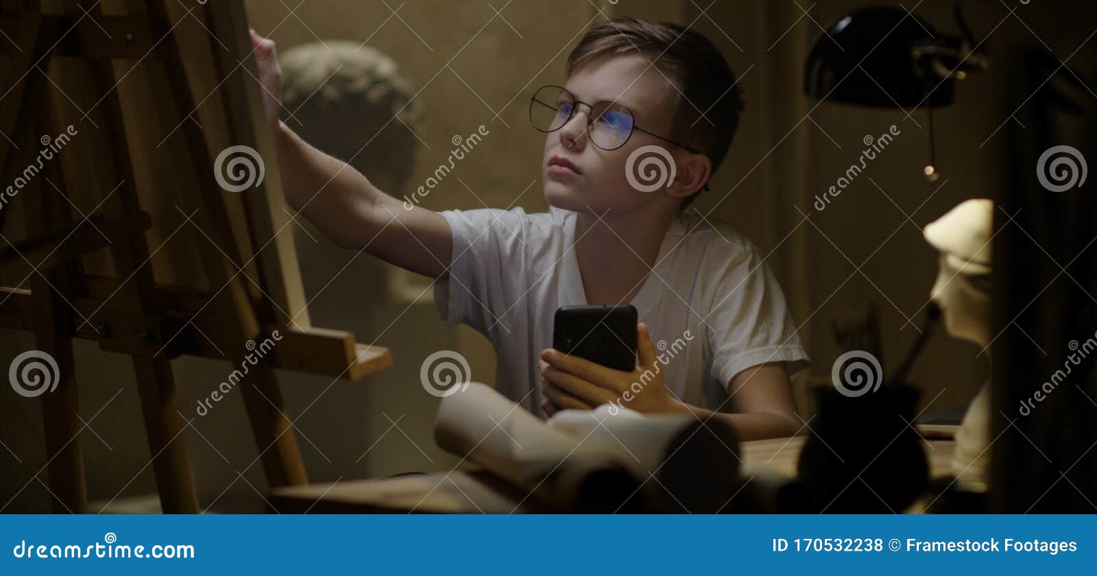 Boy Using Smartphone and Drawing Stock Photo - Image of child, workshop ...