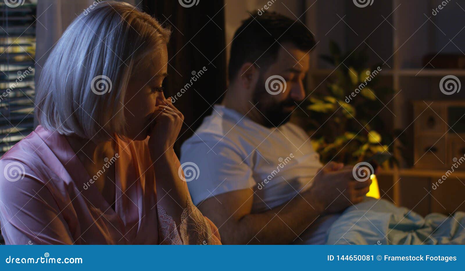 Couple Crying in Bed at Night Stock Image - Image of home, evening ...