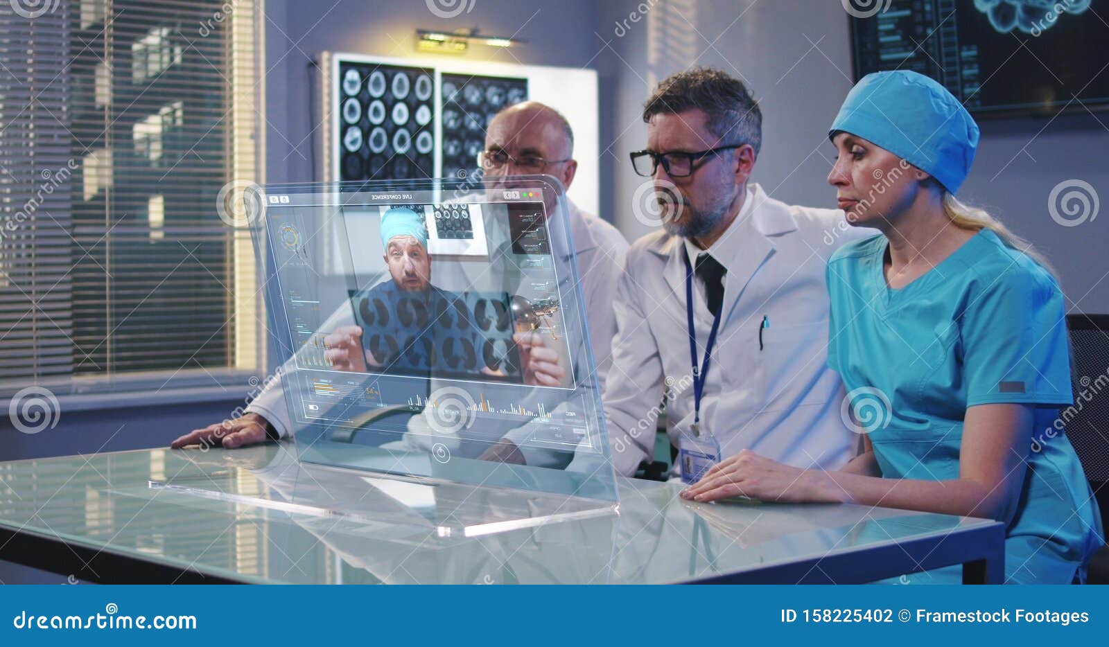 Doctors having video call stock photo. Image of talking - 158225402