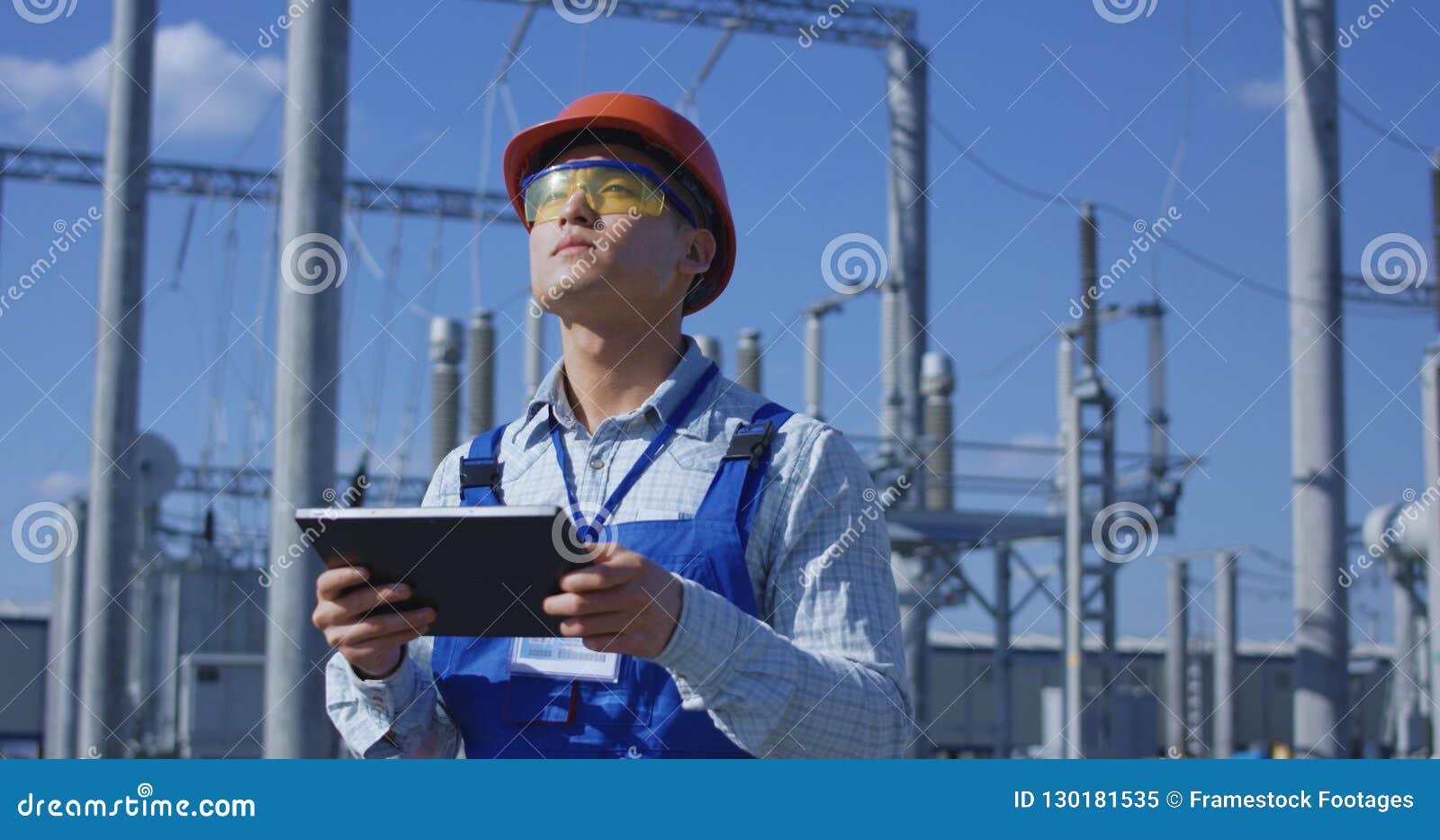 Electrical Worker on a Tablet Outside Stock Image - Image of employee ...