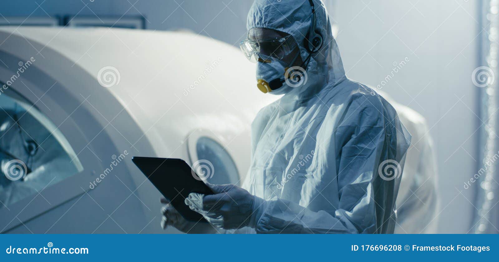 Engineer Using Tablet in Clean Room Stock Photo - Image of tablet ...