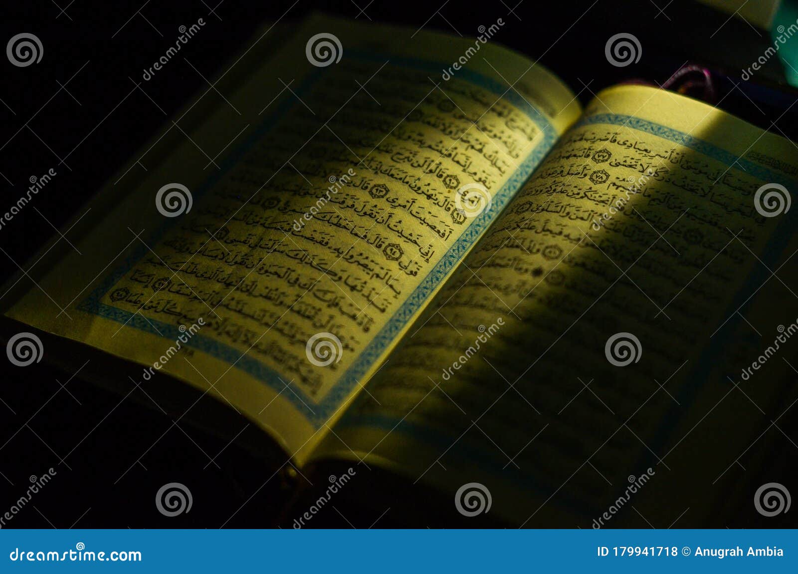 Medium Shot of the Holy Quran, Light and Shadow. Stock Photo - Image of ...