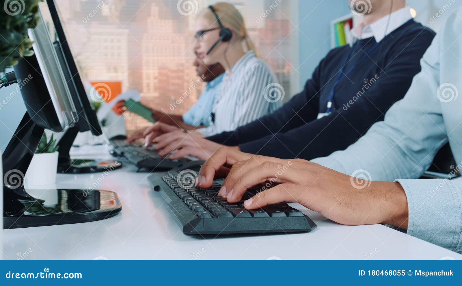 Medium Shot of Operators Hands Typing on Keyboard in Modern Office ...