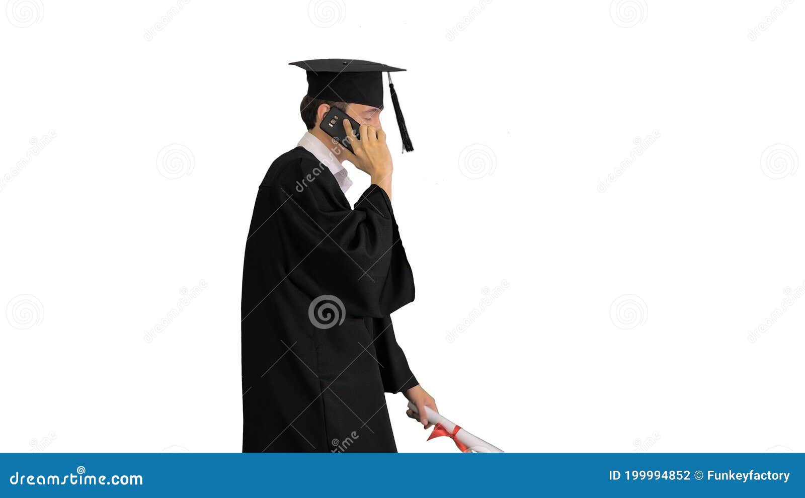 Graduating Student Talking on Smartphone and Walking on White Ba Stock ...