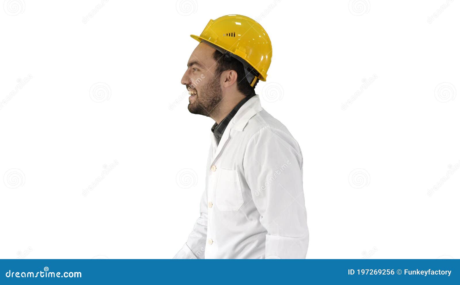 Smiling Construction Engineer Catching a Cap and Putting it on O Stock ...