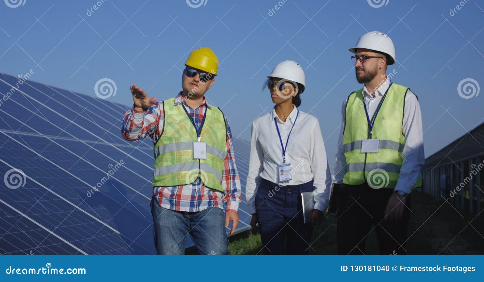 Electrical Workers Walking at a Solar Farm Stock Photo - Image of ...