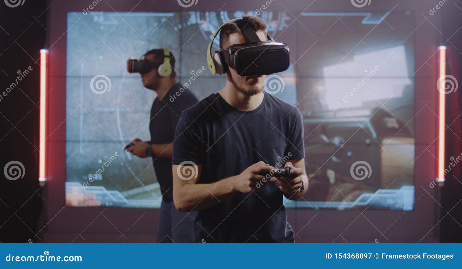 Young men playing VR game stock image. Image of game - 154368097