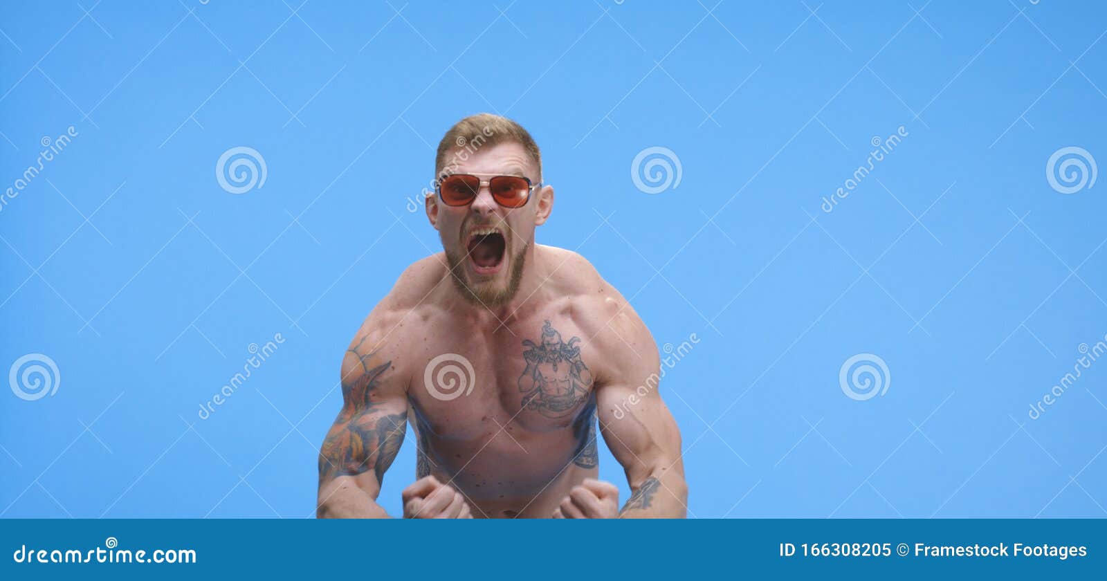 Buff Man Showing Off for Camera Stock Image - Image of topless, tattoo ...