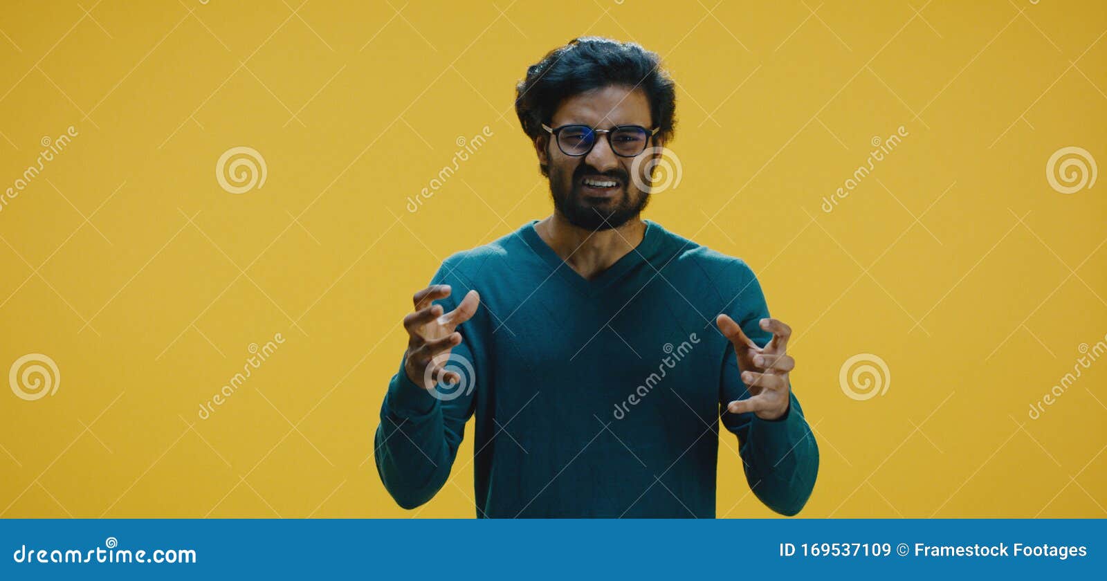 Young man angrily grasping stock image. Image of nervous - 169537109