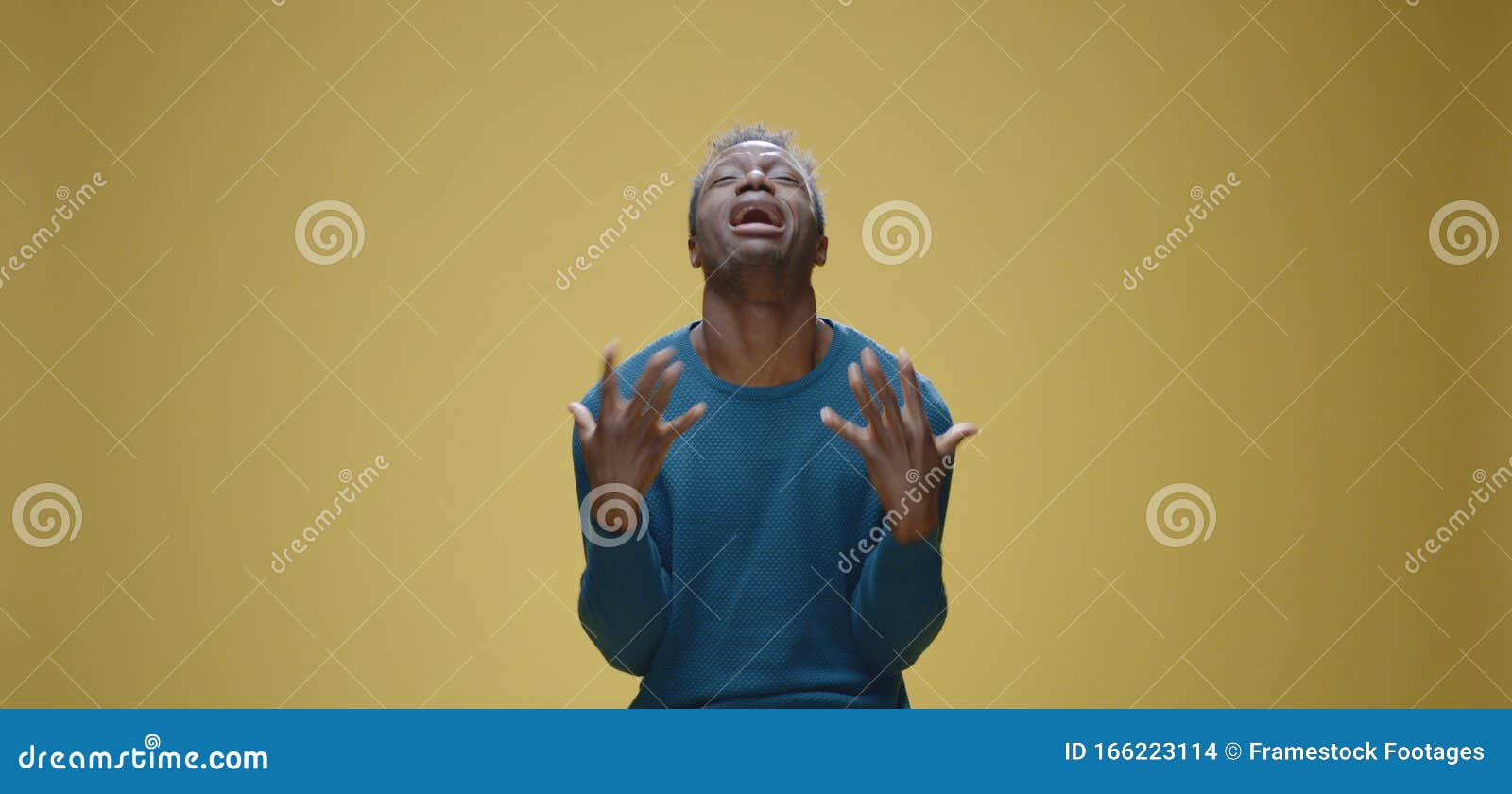 Young man crying to camera stock photo. Image of emotion - 166223114