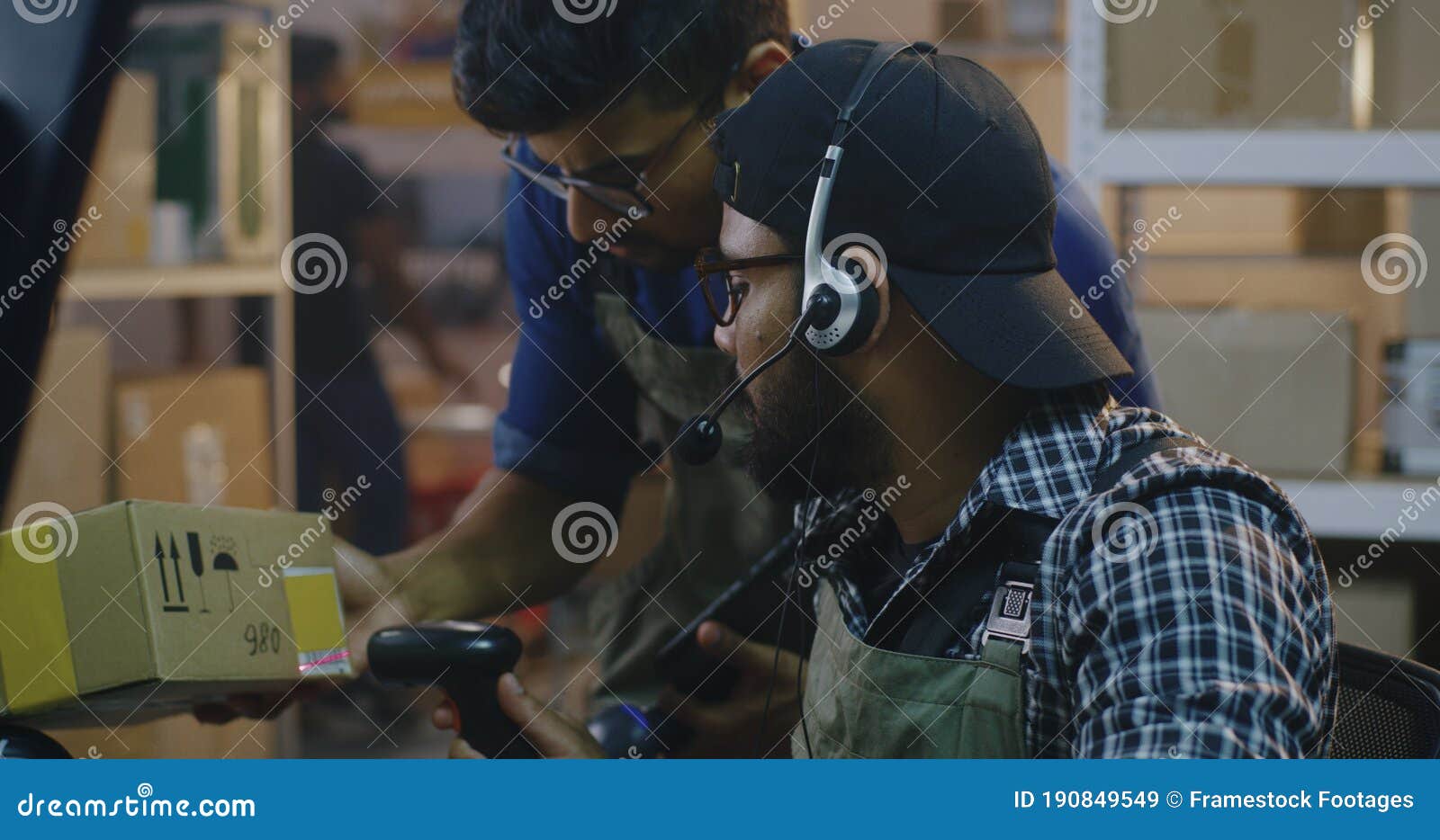 Young Man Working in Distribution Center Stock Image - Image of ...