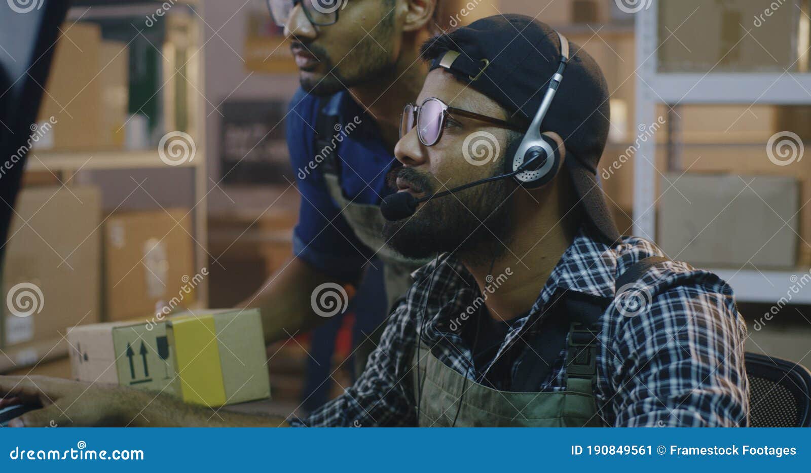 Young Man Working in Distribution Center Stock Image - Image of desk ...