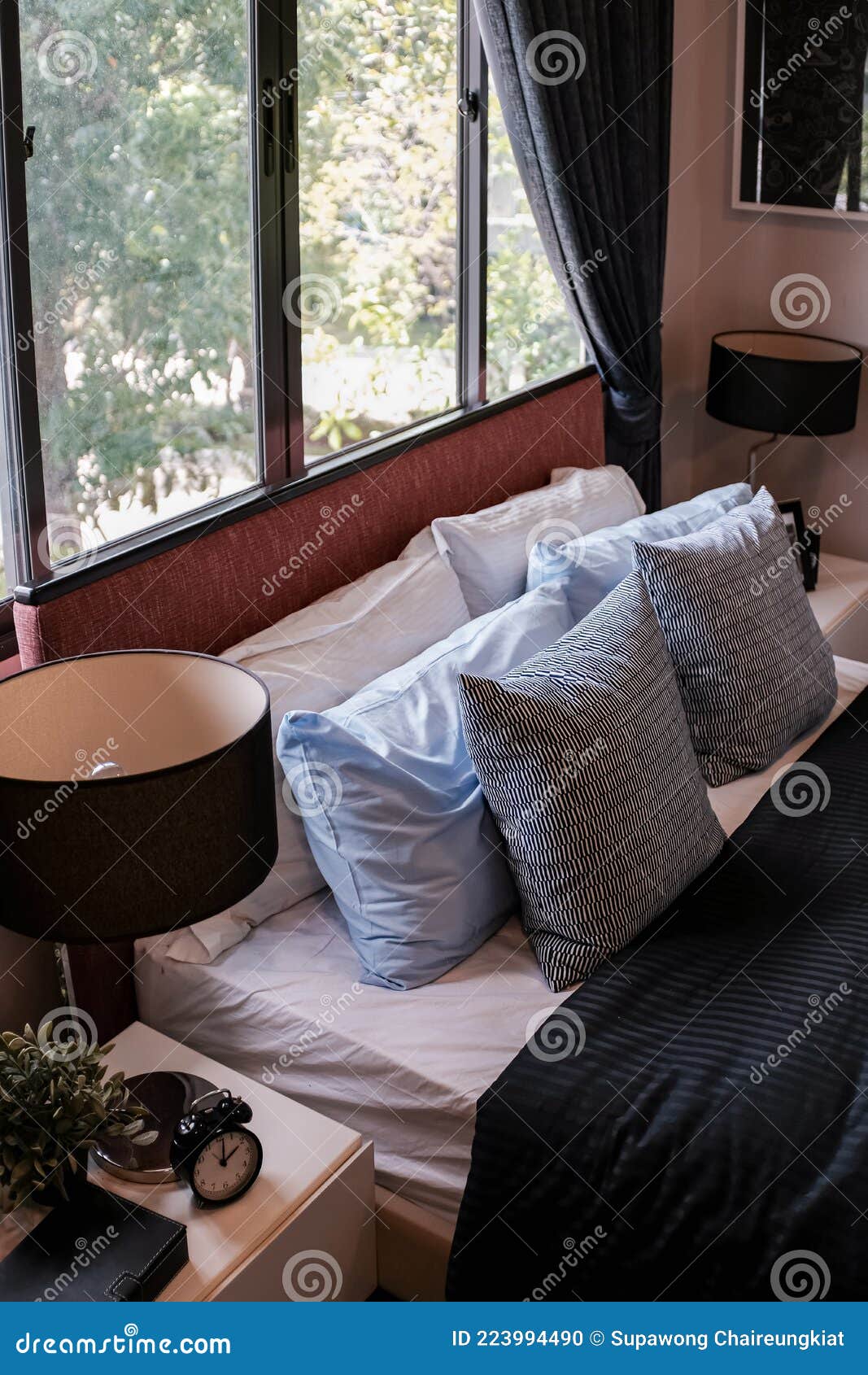 Medium-sized Bedroom with Large Windows Stock Photo - Image of comfort ...