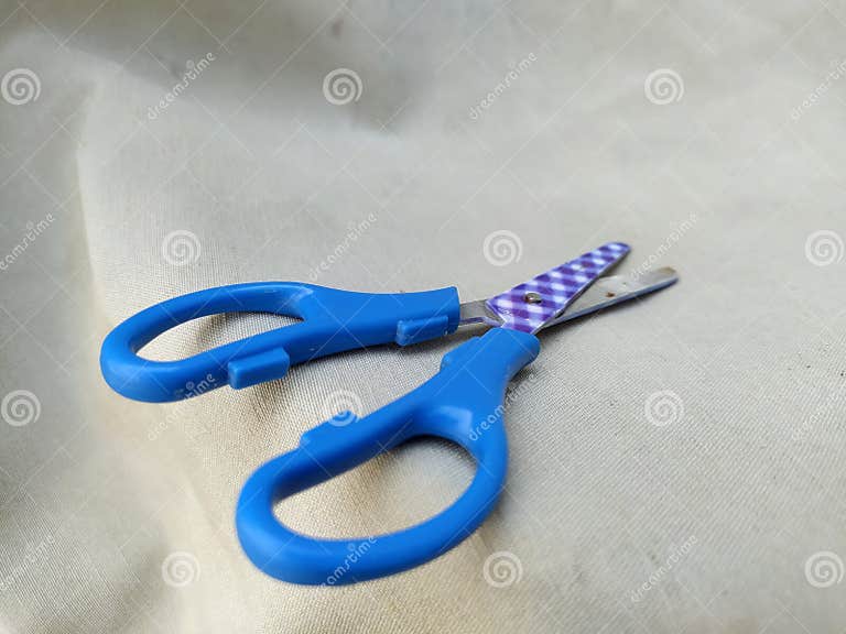 Medium Sized Paper Scissors with Light Blue Handles Stock Image - Image ...