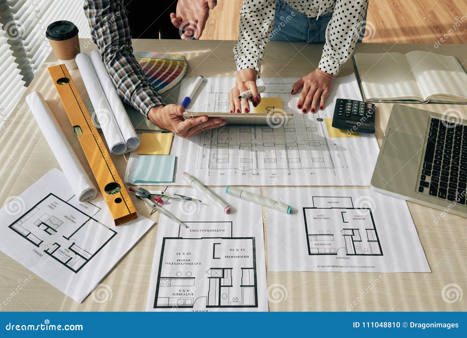 Meeting on architects stock photo. Image of cropped - 111048810