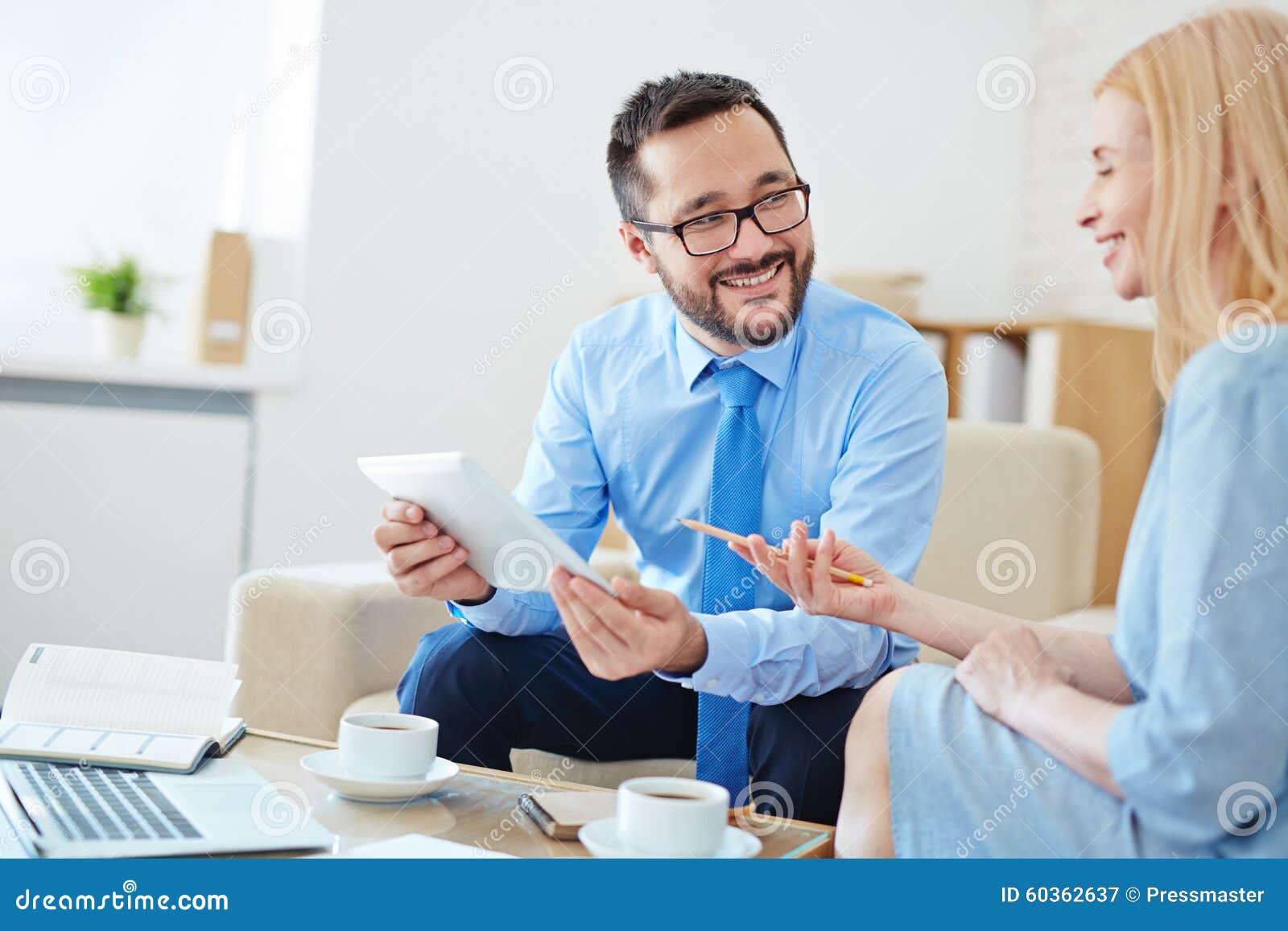 Meeting of co-workers stock image. Image of showing, young - 60362637