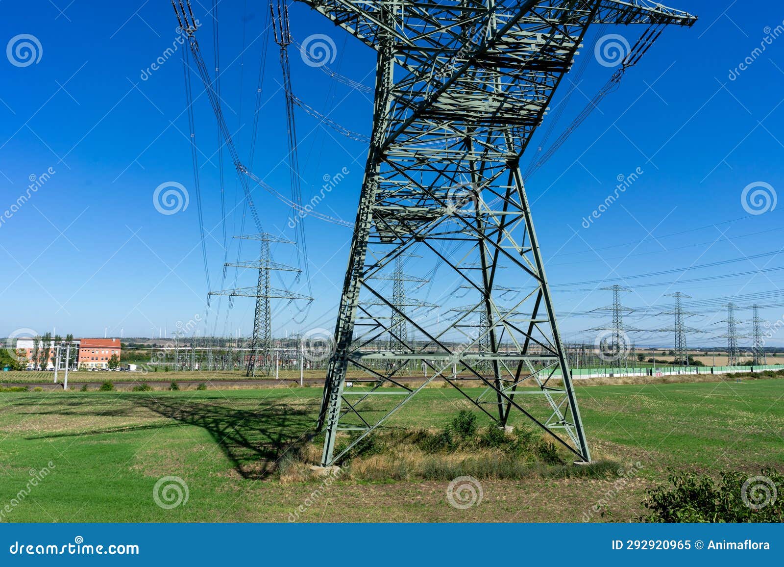 Mega Electric Power Lines in the Field Stock Image - Image of ...