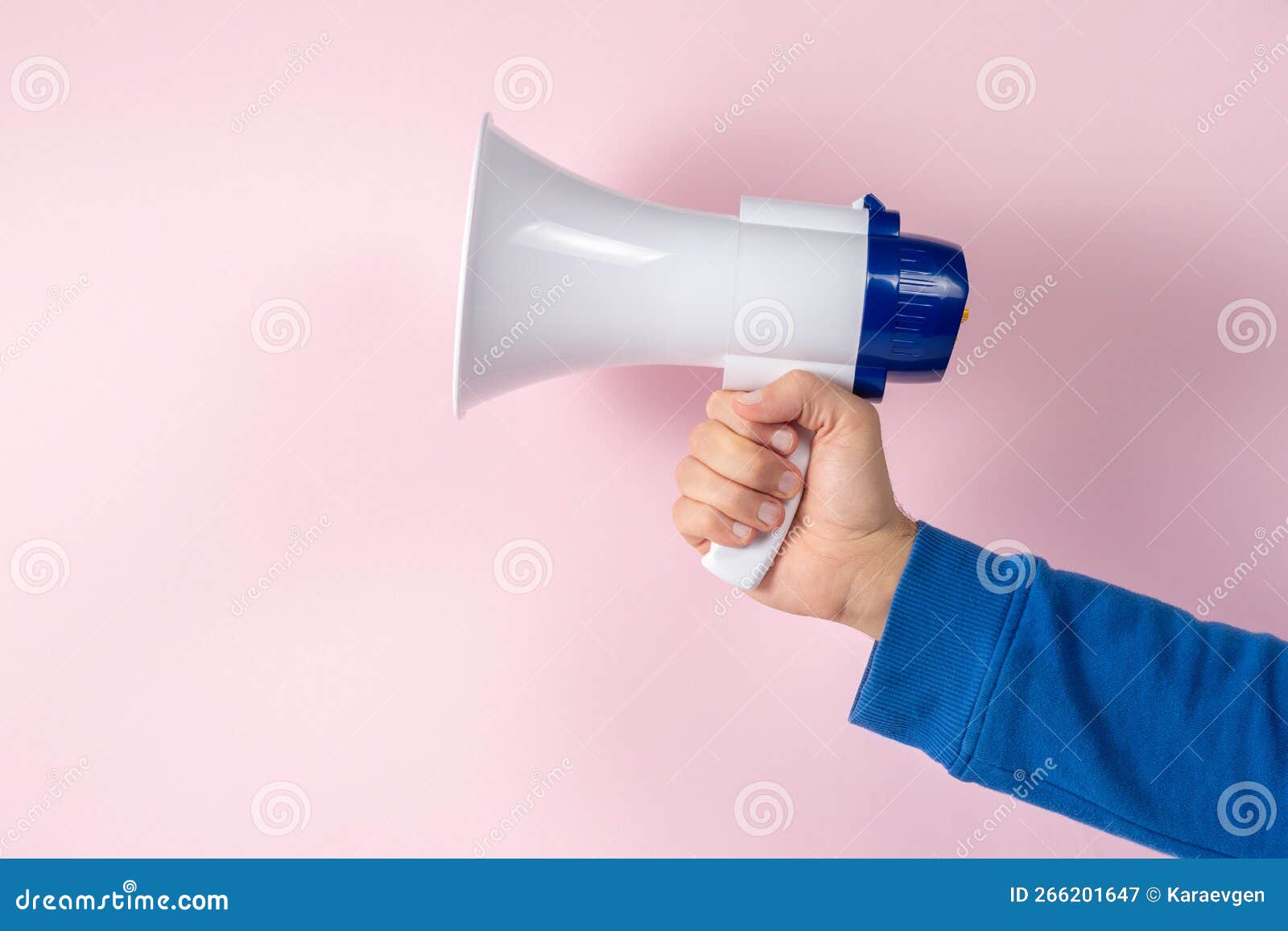Megaphone in Hand on Bright Background. Creative Announcement Concept ...