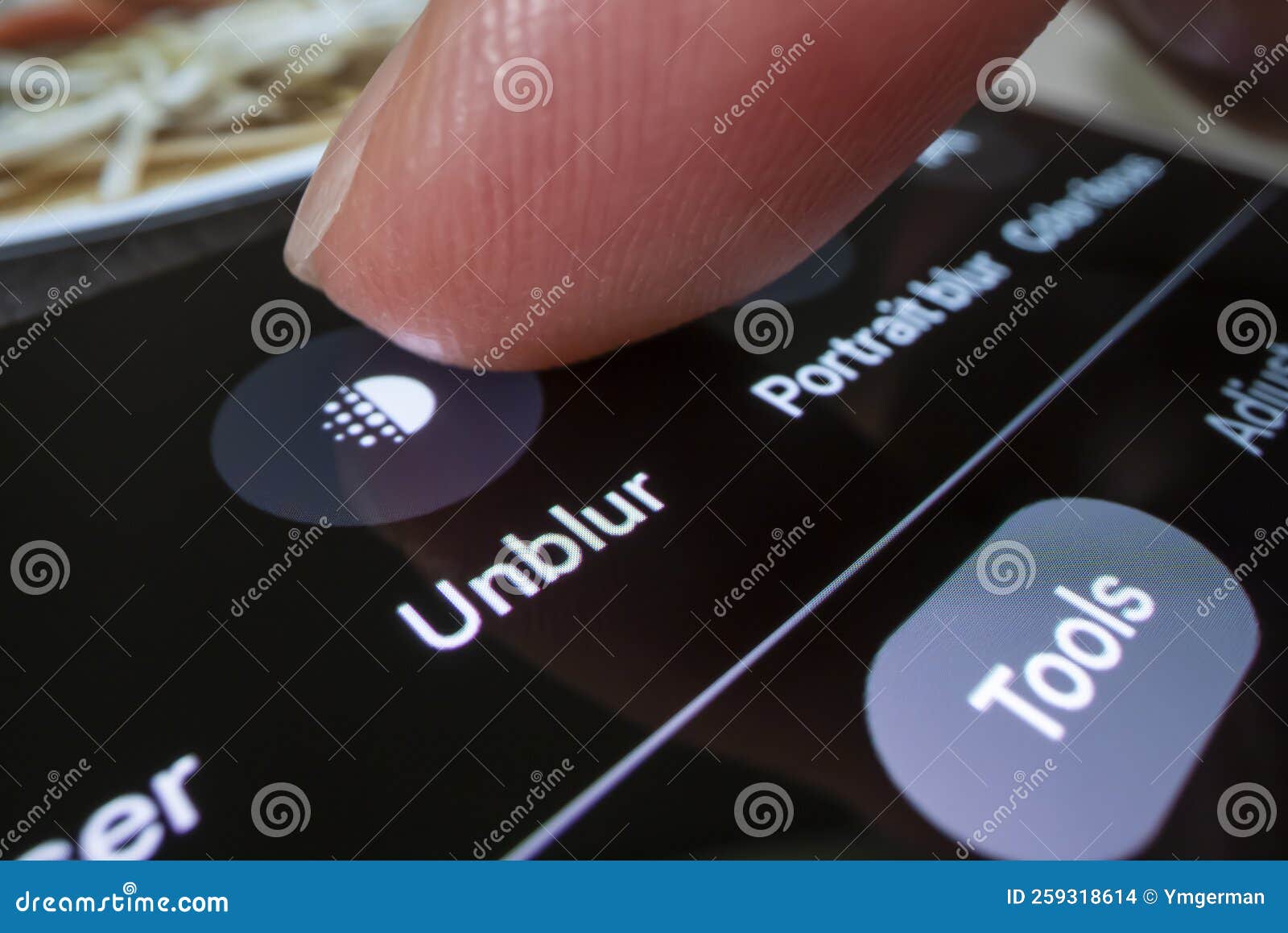 Close-up View of Using the Unblur Function of Google Pixel 7 Pro To Fix ...