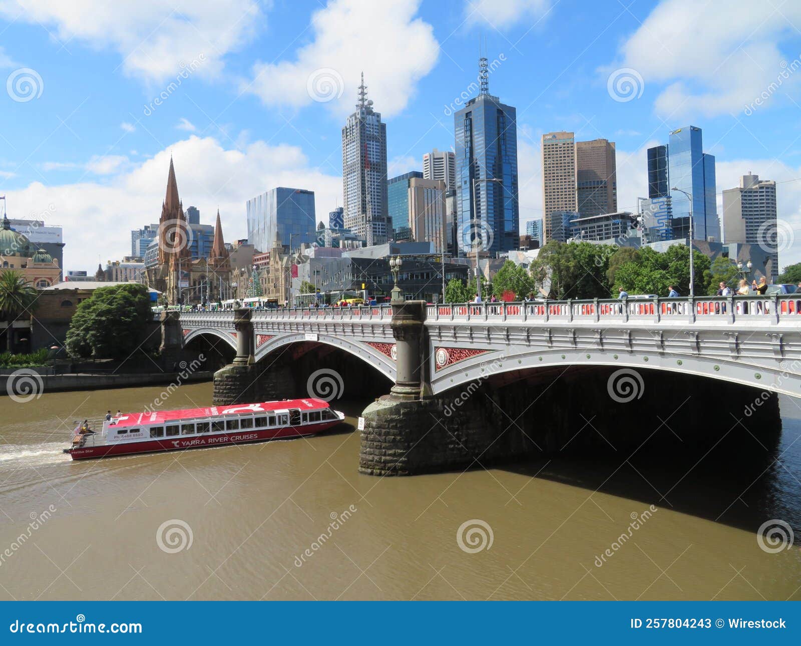 Melbourne Cityscape with Modern Buildings and a Boat Under the Bridge ...