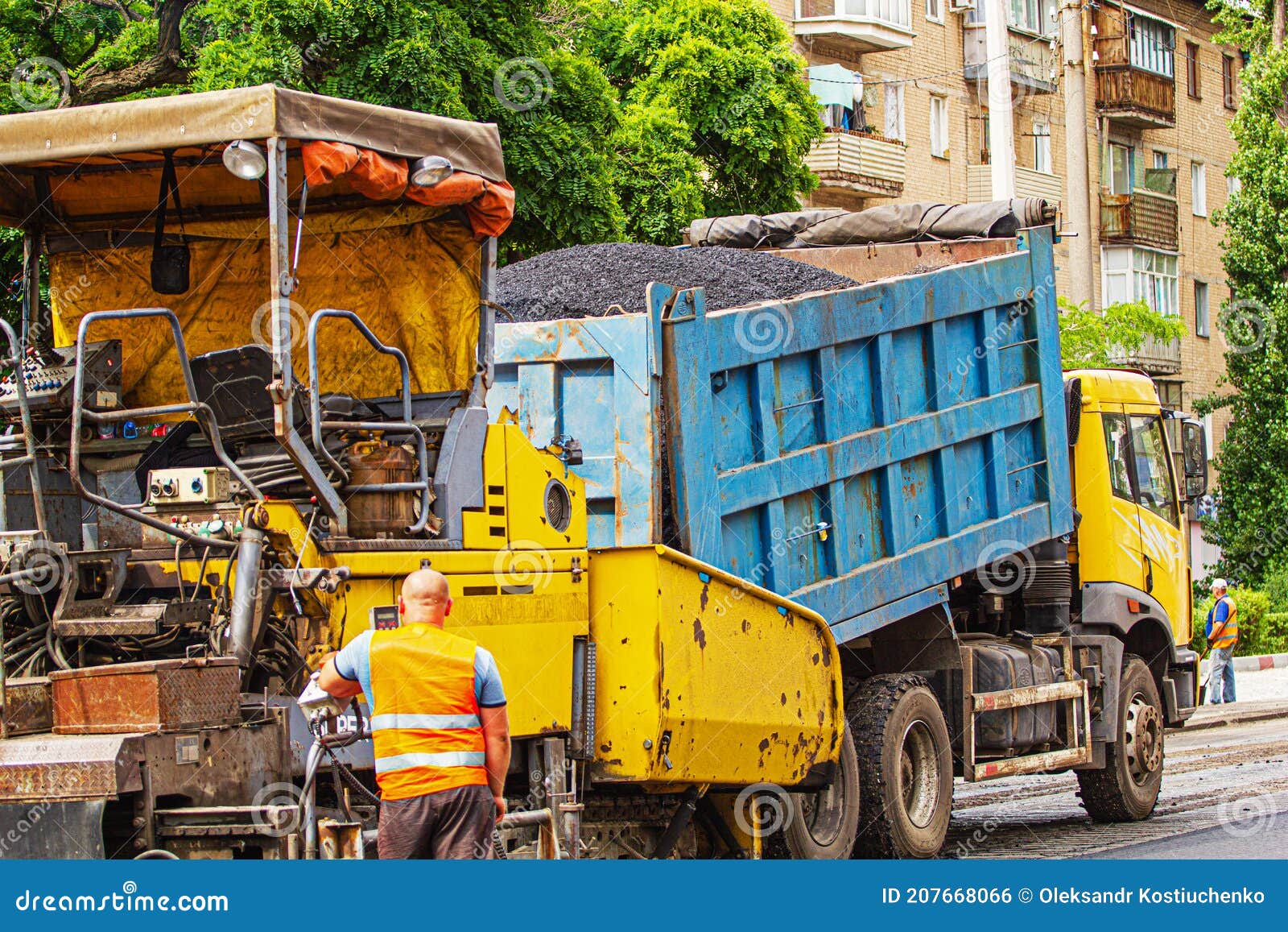 Melitopol, Ukraine, Date May 27, 2017. Loading Fresh Asphalt into the ...