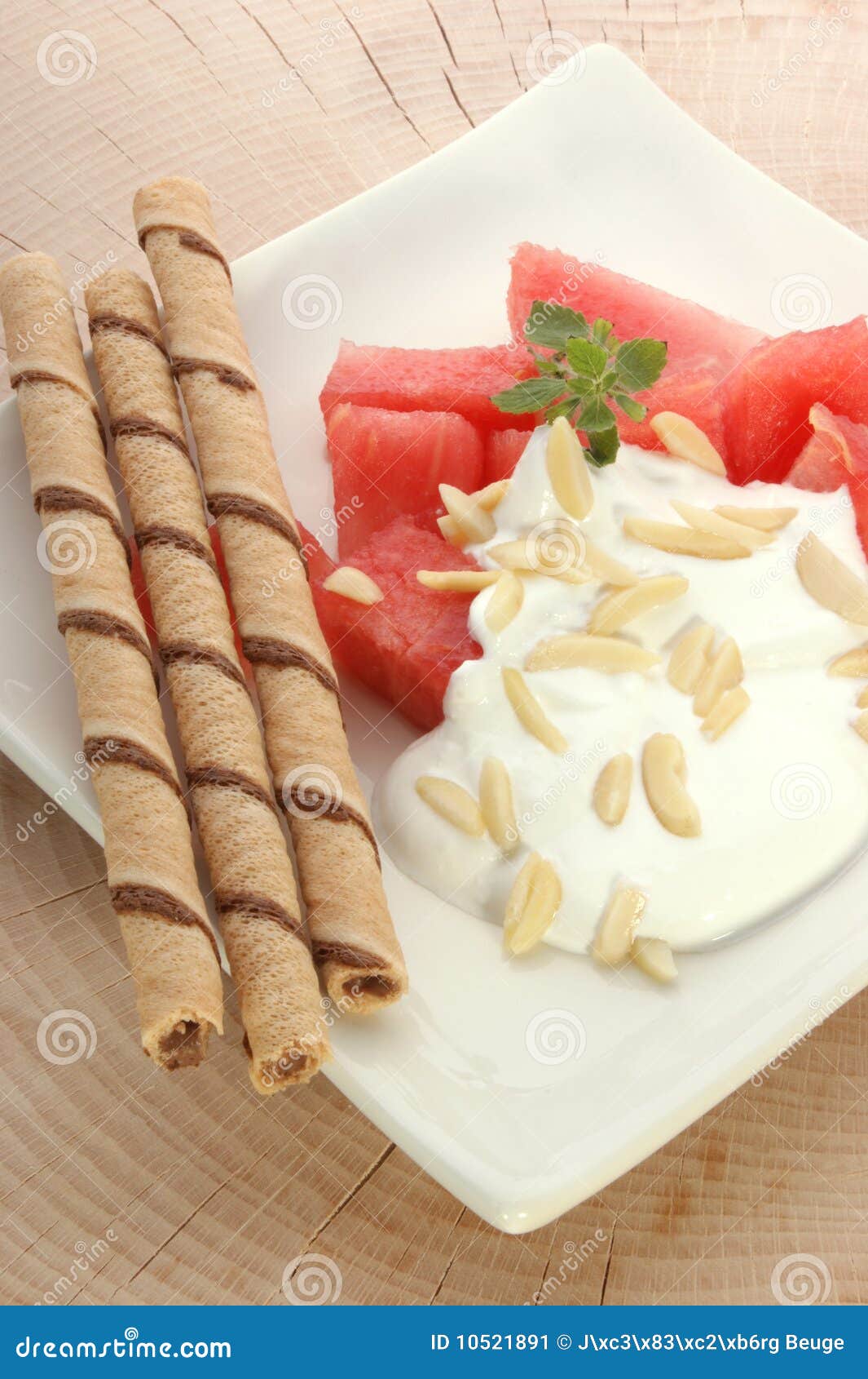 Melon with Cream Fresh and Almond Slivers Stock Image - Image of fine ...