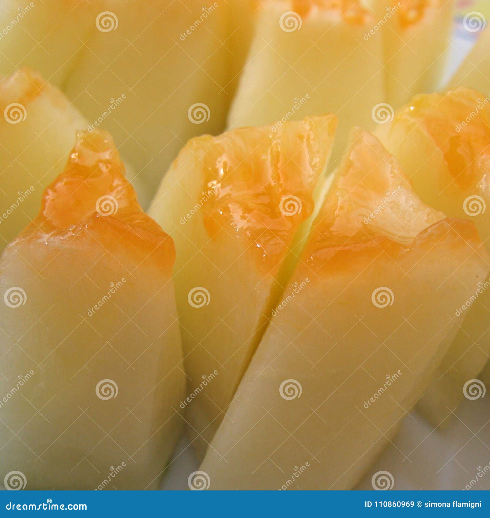 Melon cubes closeup stock image. Image of green, isolated - 110860969