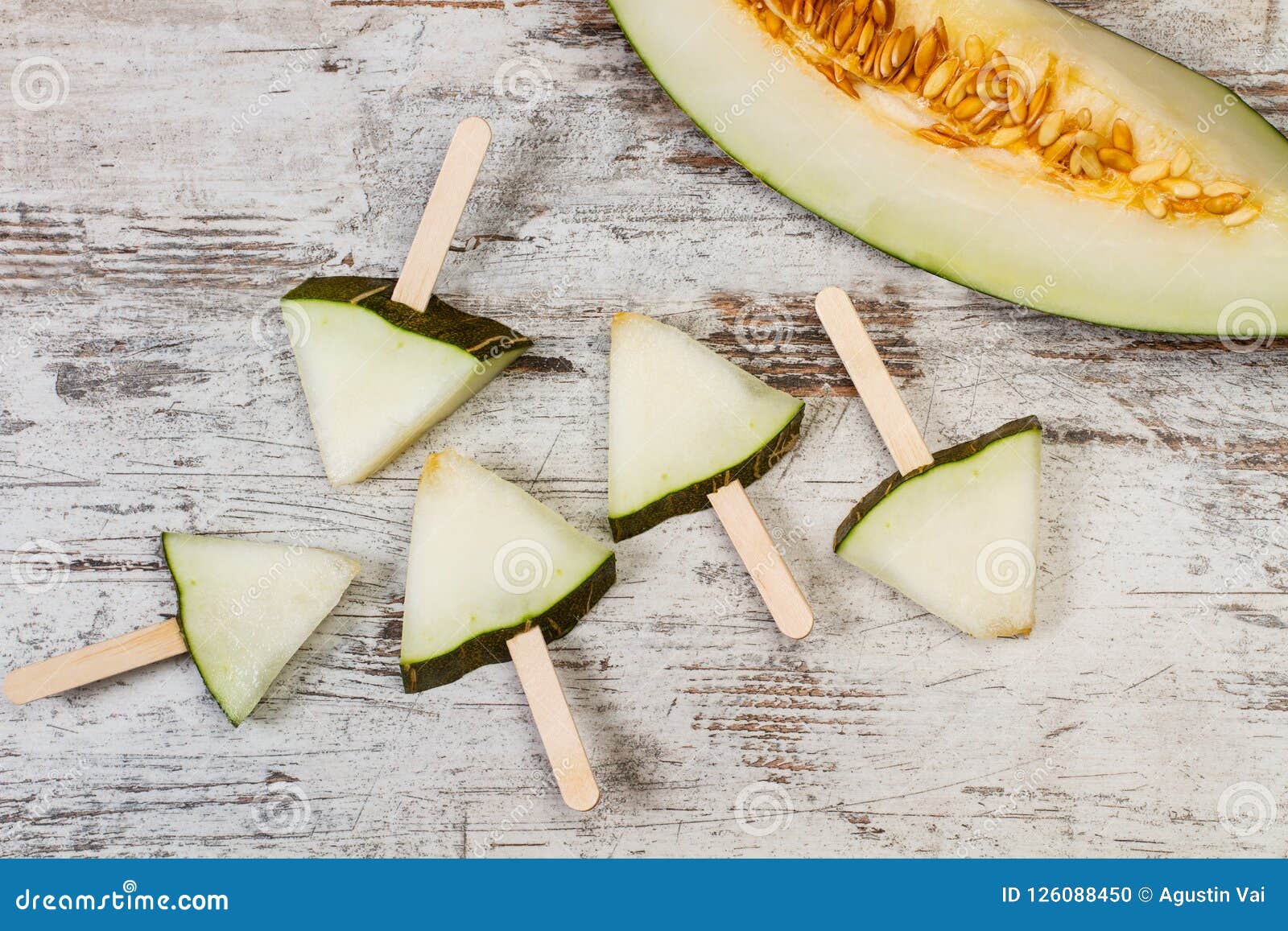 Melon cut into triangles stock photo. Image of natural - 126088450