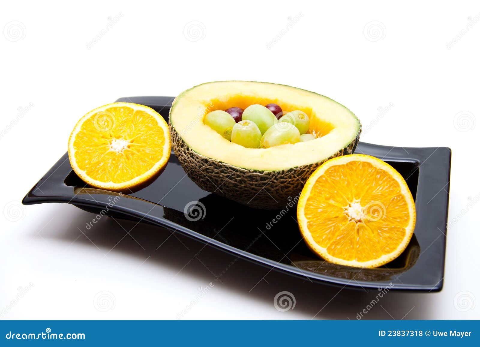 Melon with Grapes and Oranges Stock Photo - Image of tasty, grapes ...