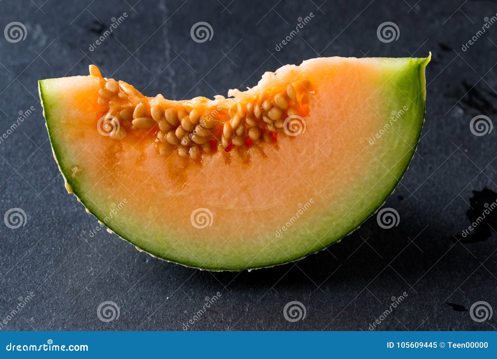 Melon slice on rock plate stock image. Image of juicy - 105609445