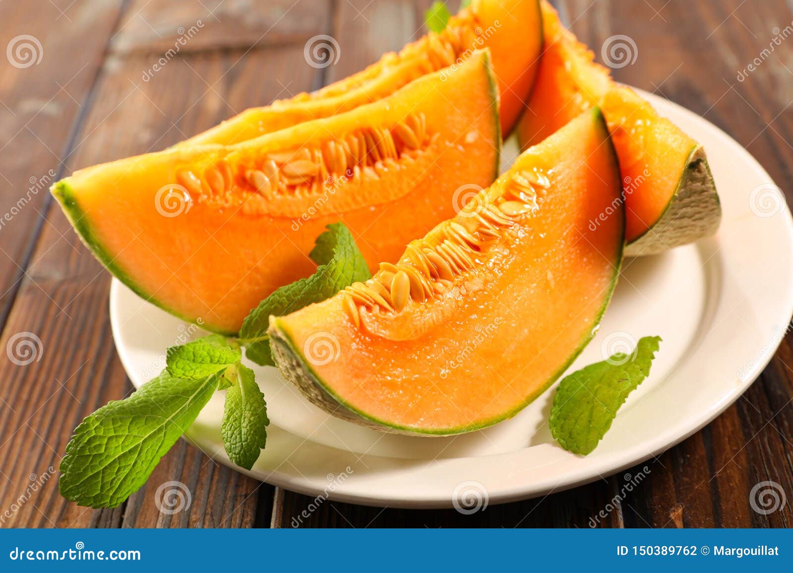 Melon and slices with mint stock photo. Image of diet - 150389762