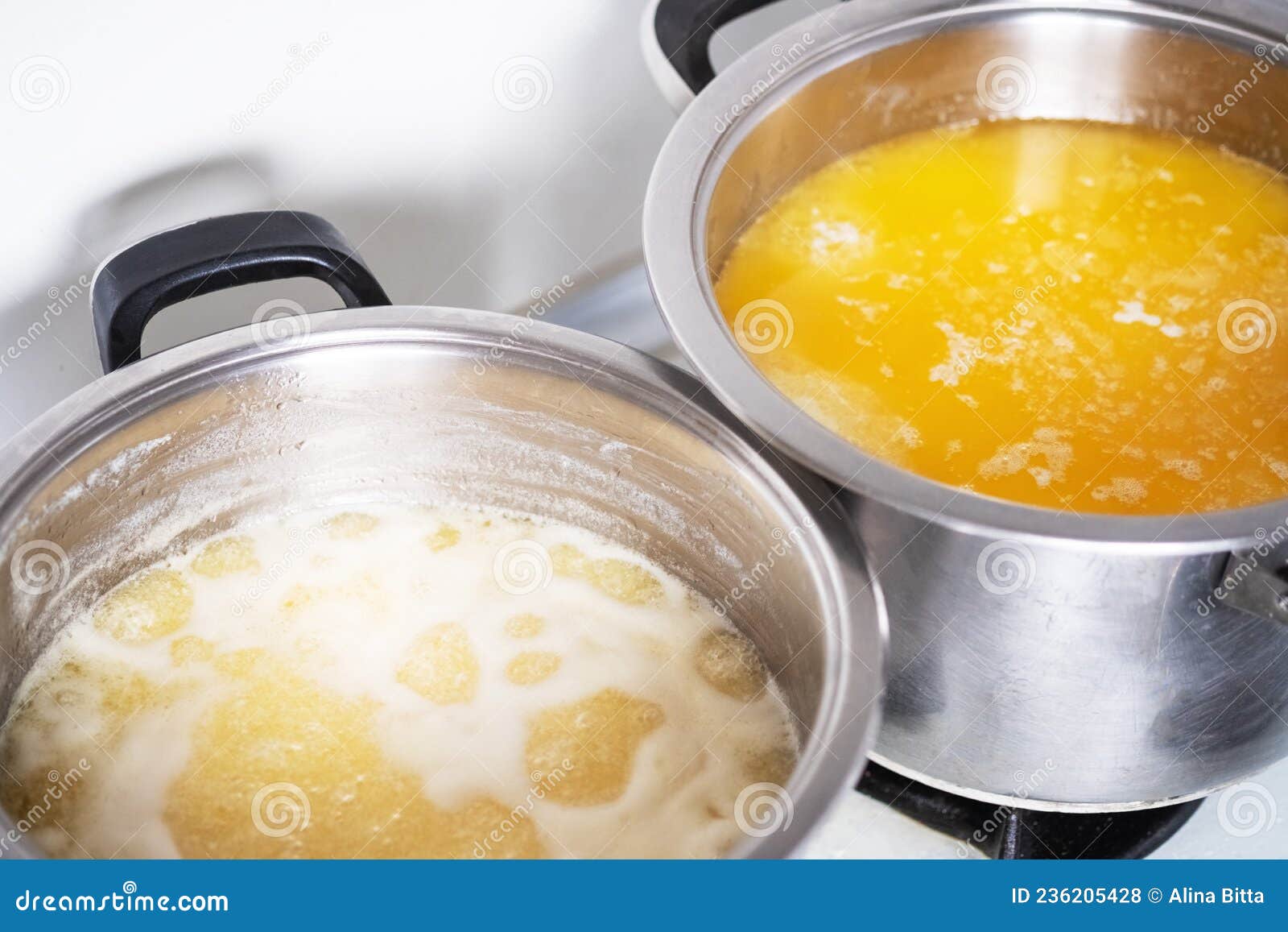 Melt the Butter in a Stainless Saucepan. Cooking Ghee Stock Photo ...