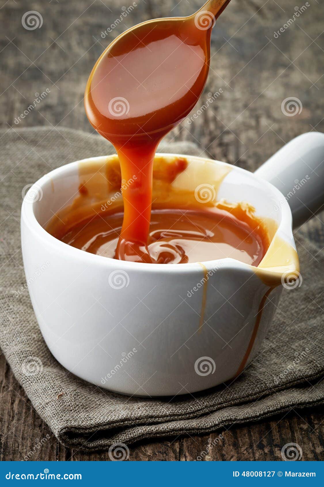 Melted caramel sauce stock image. Image of brown, making - 48008127