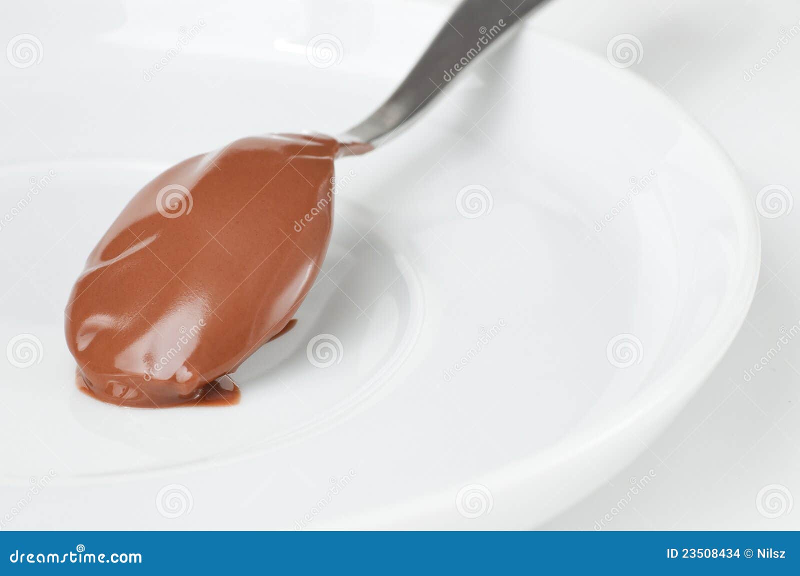Melted chocolate spoon stock photo. Image of baking, fluid - 23508434