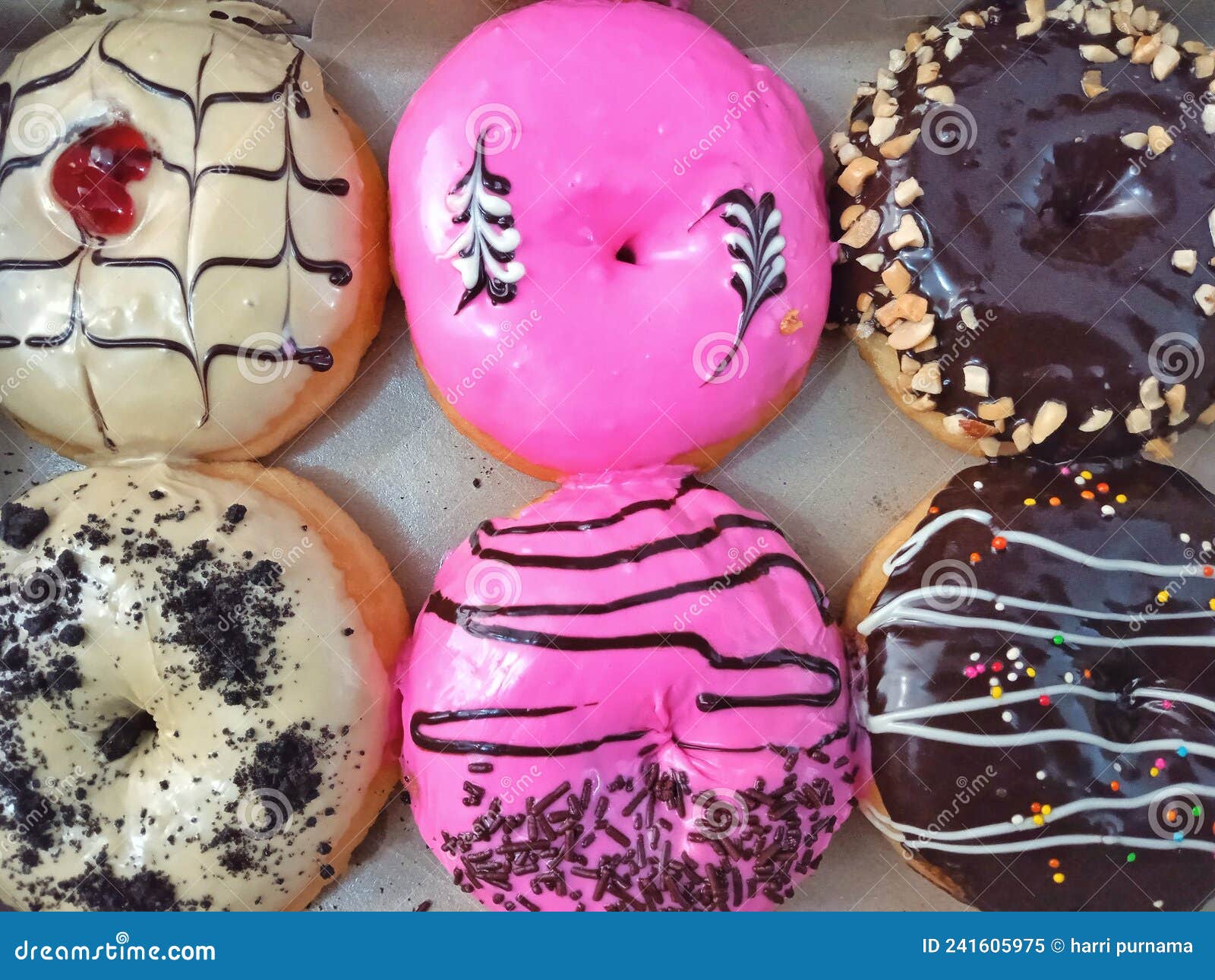 Melted donuts. stock image. Image of melted, sweet, delicious - 241605975