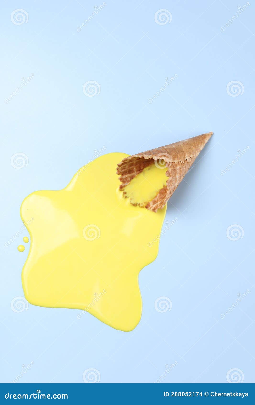 Melted Ice Cream and Wafer Cone on Light Blue Background, Top View ...