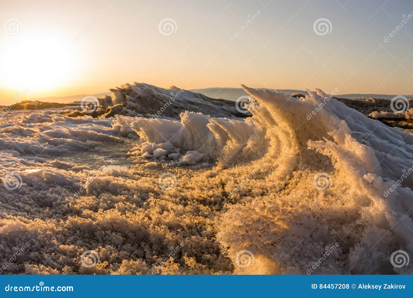 Melted Snow Icy Wave in the Light of the Setting Sun Stock Photo ...