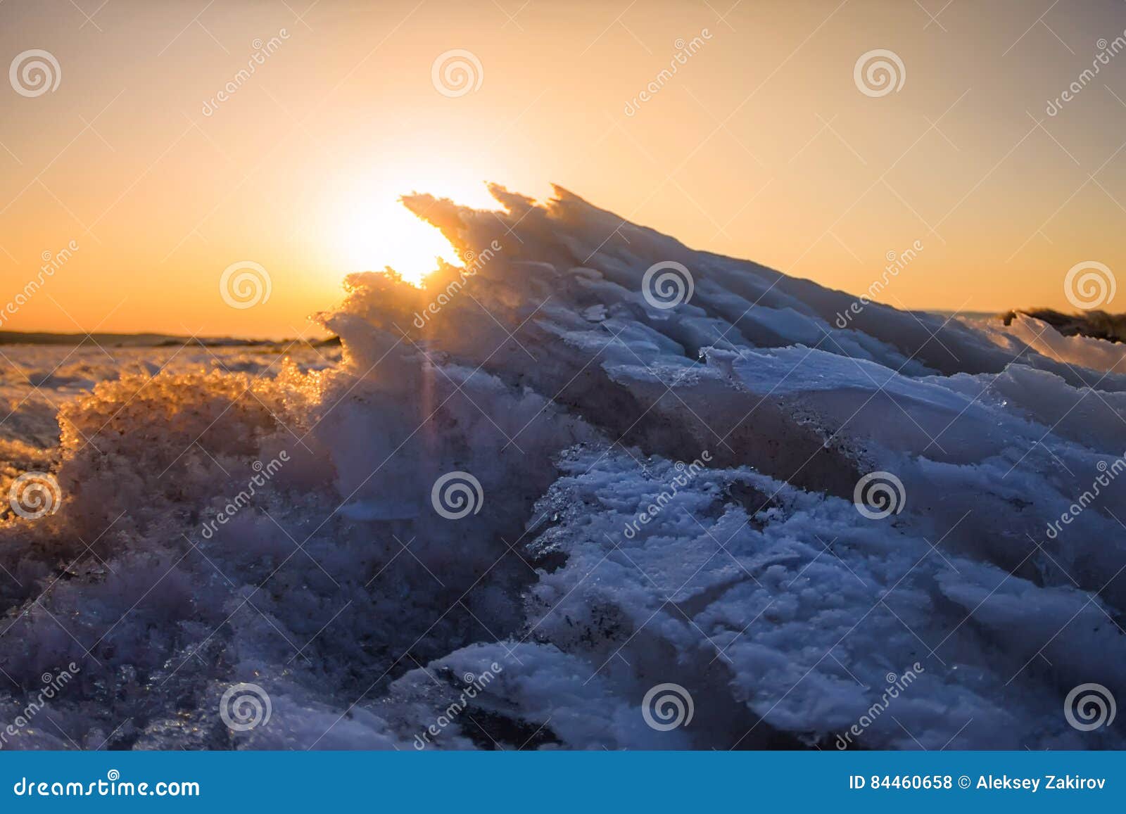 Melted Snow Icy Wave in the Light of the Setting Sun Stock Photo ...