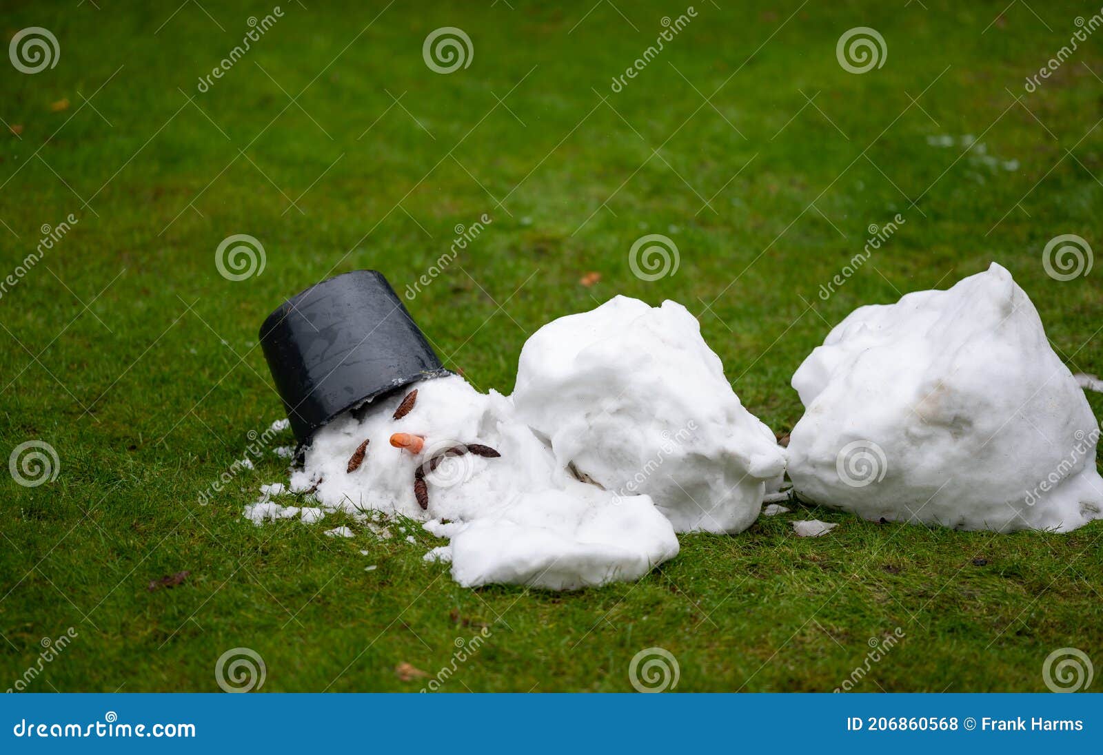 A Melted Snow Man with a Sad Face As Symbol of the End of the Winter ...