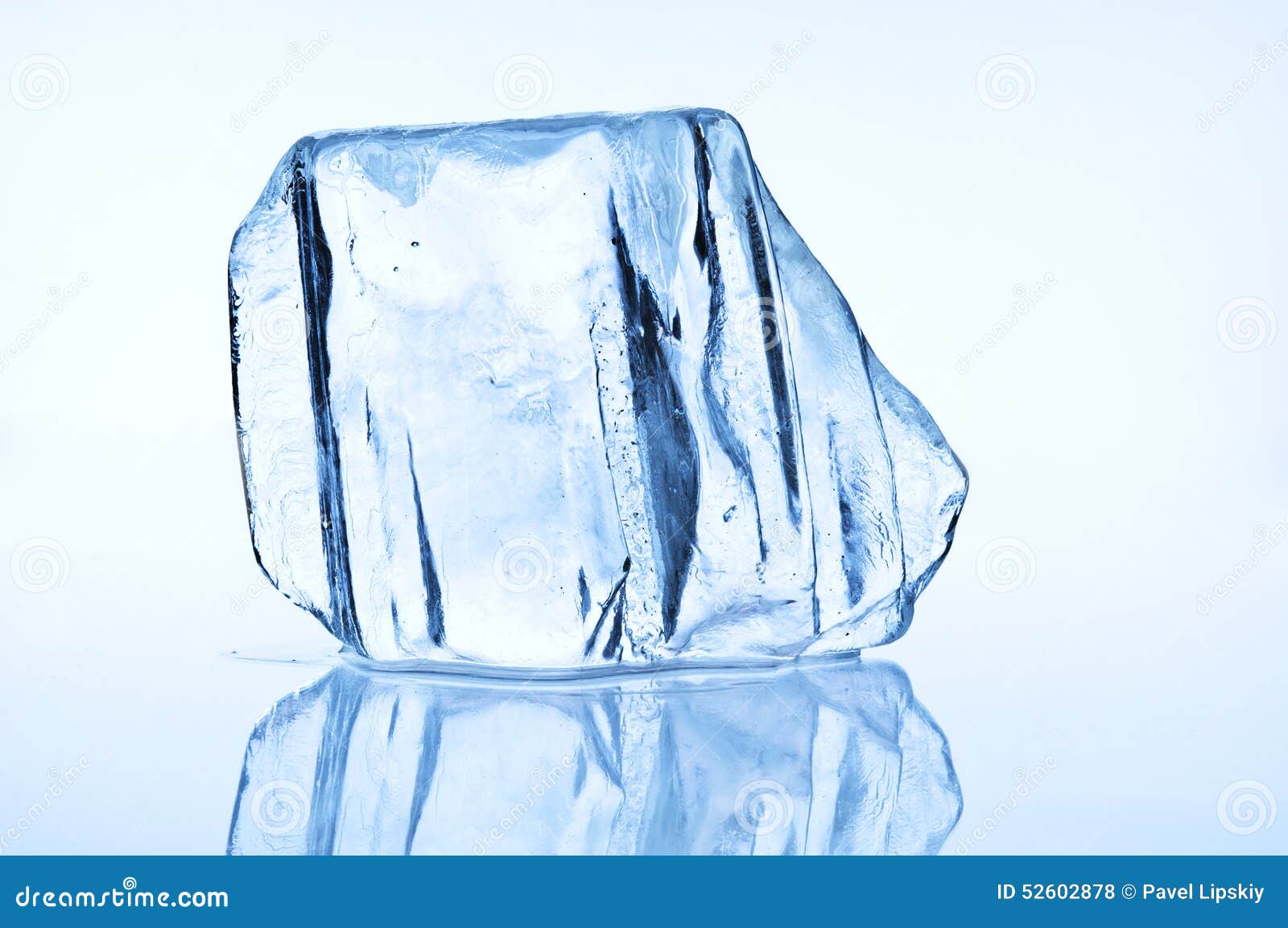 Melting Ice On A Blue Background. A Dripping Drop From The Central Ice ...