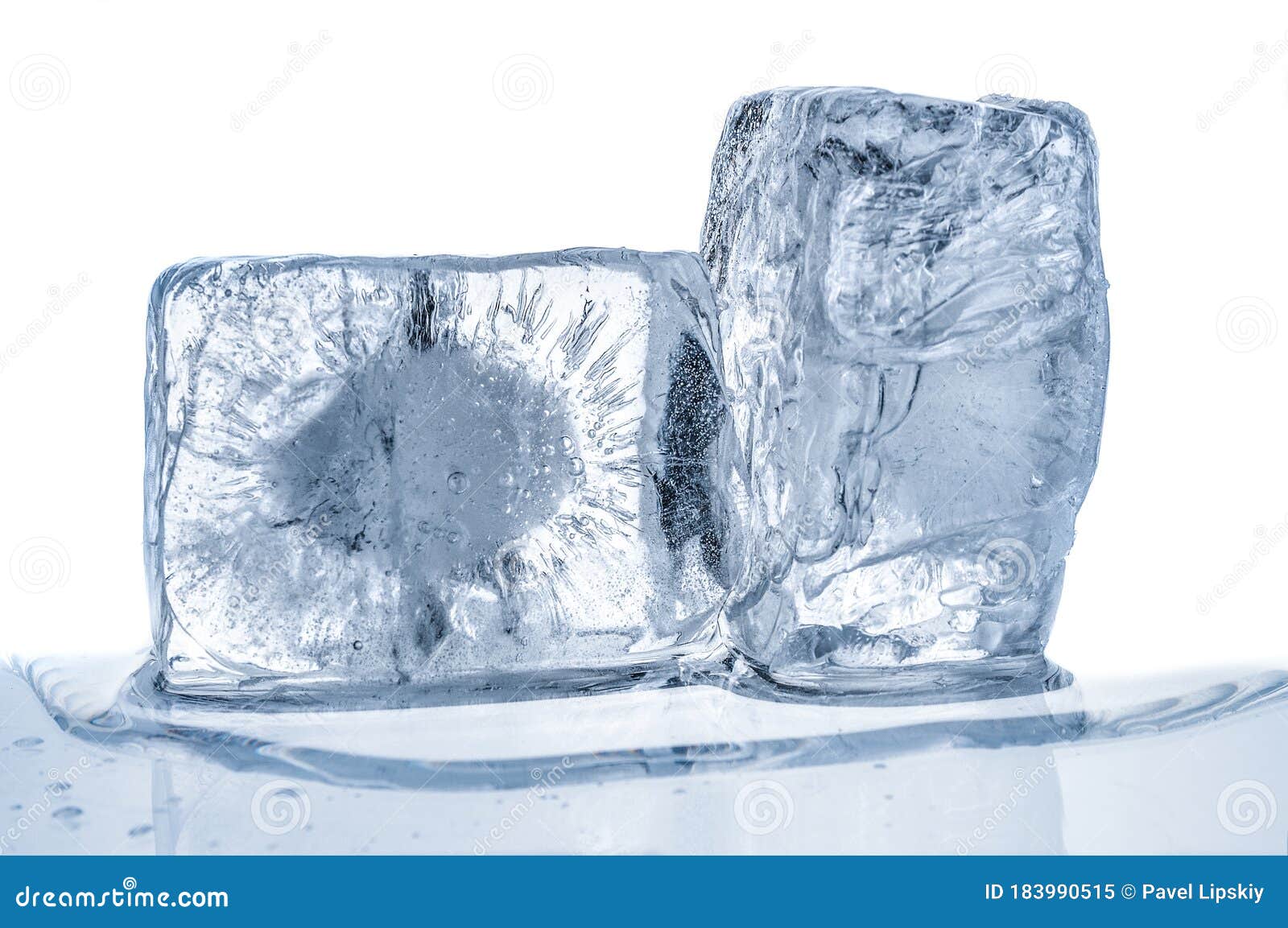 Melting Ice On A Blue Background. A Dripping Drop From The Central Ice ...